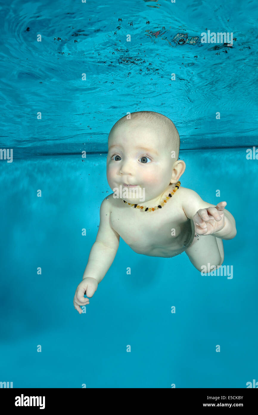 Baby swimming underwater hi-res stock photography and images - Alamy