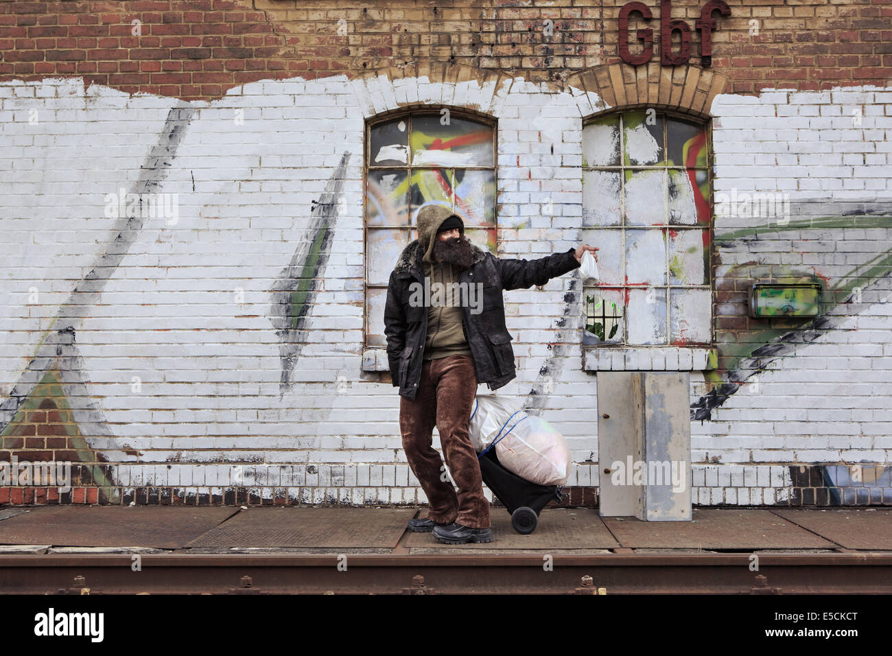 scenes from the life of a homeless man in a town Stock Photo - Alamy