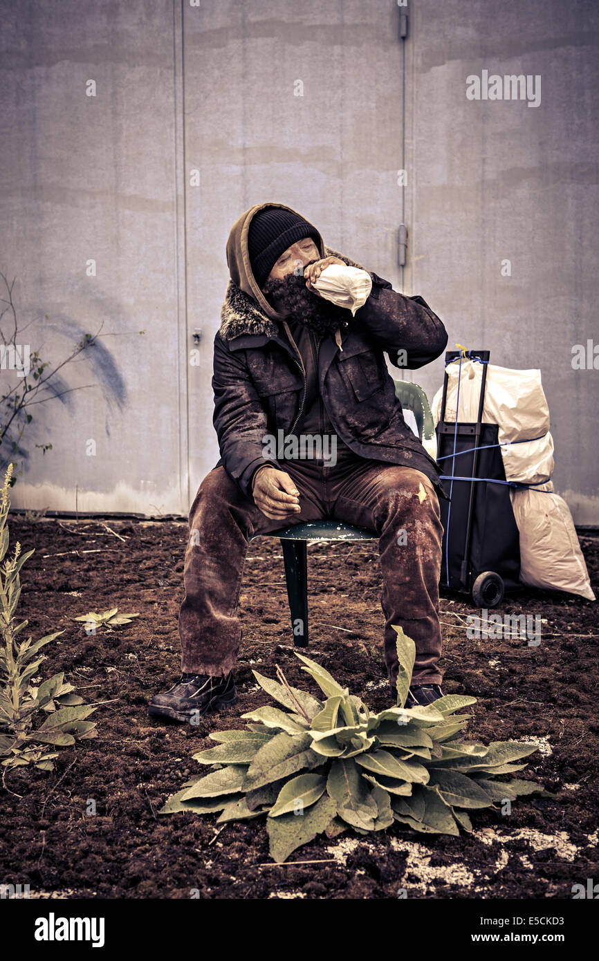 scenes from the life of a homeless man in a town Stock Photo - Alamy