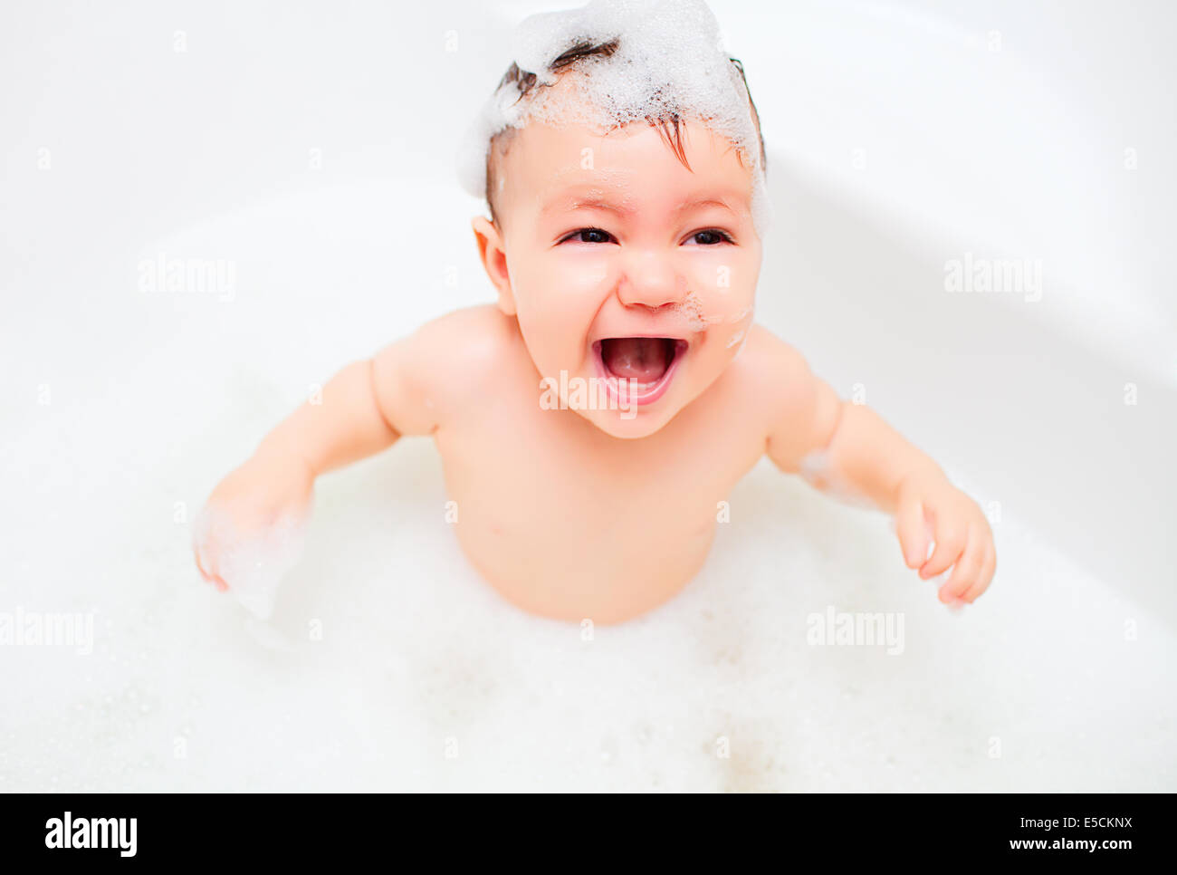 litlle child bathes in a bathroom Stock Photo - Alamy