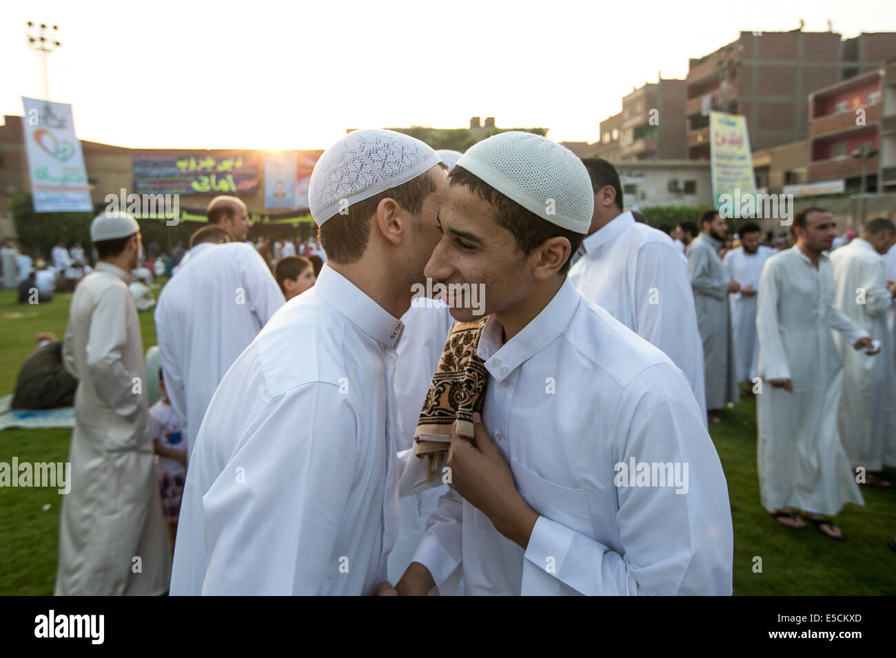 Cairo, Egypt. 28th July, 2014. Egyptians greet each other after the ...