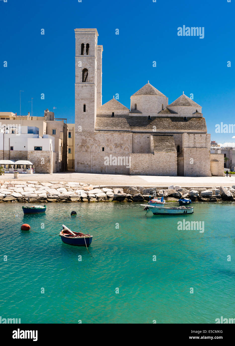 Fishing boats in the harbor, Romanesque Old Cathedral, San Corrado ...