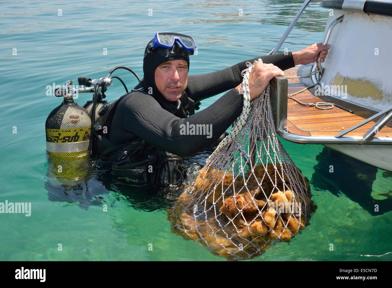 Sponge diver hi-res stock photography and images - Alamy