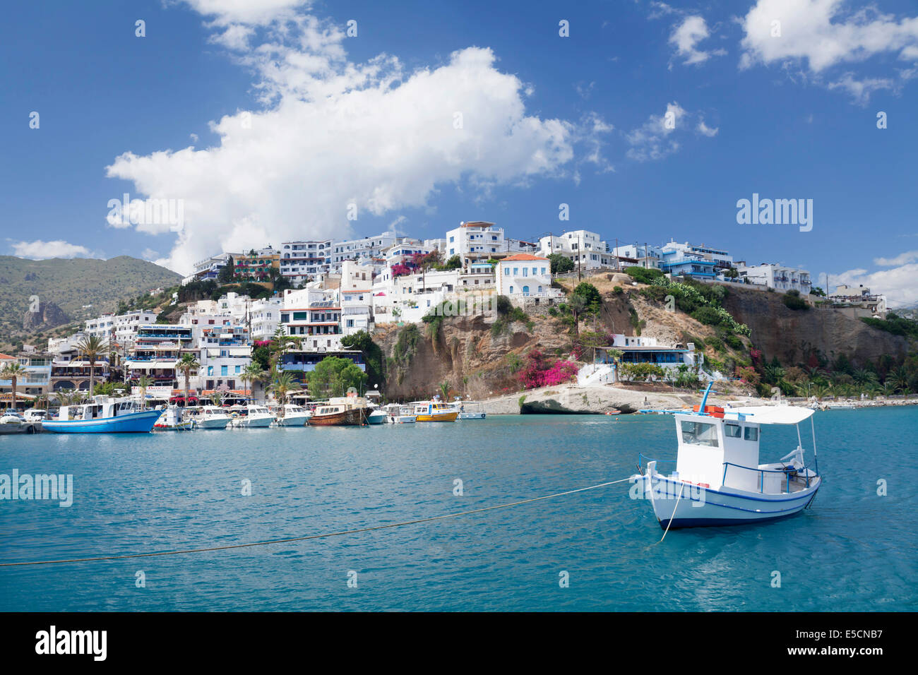 Boat off the seaside village of Agia Galini, Crete, Greece Stock Photo ...