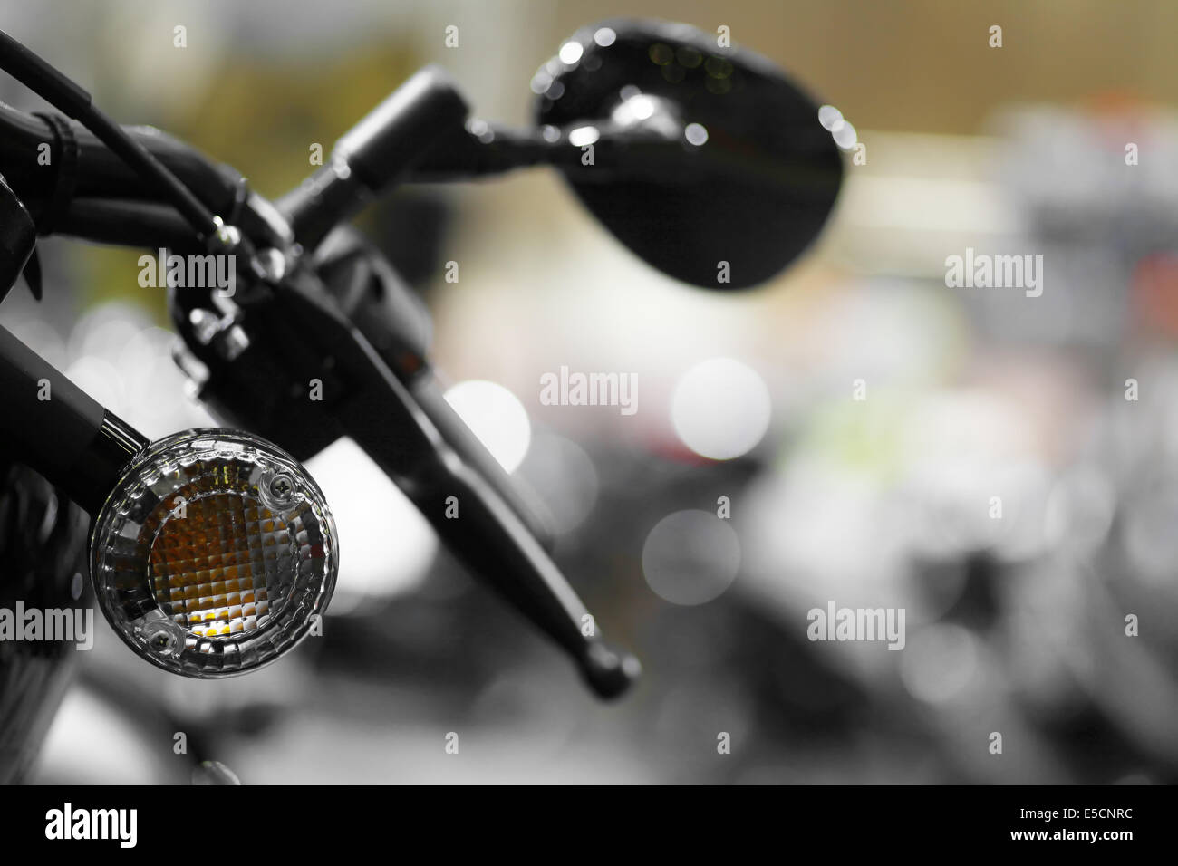 Detail with the lever and turn signal of a motorcycle Stock Photo - Alamy