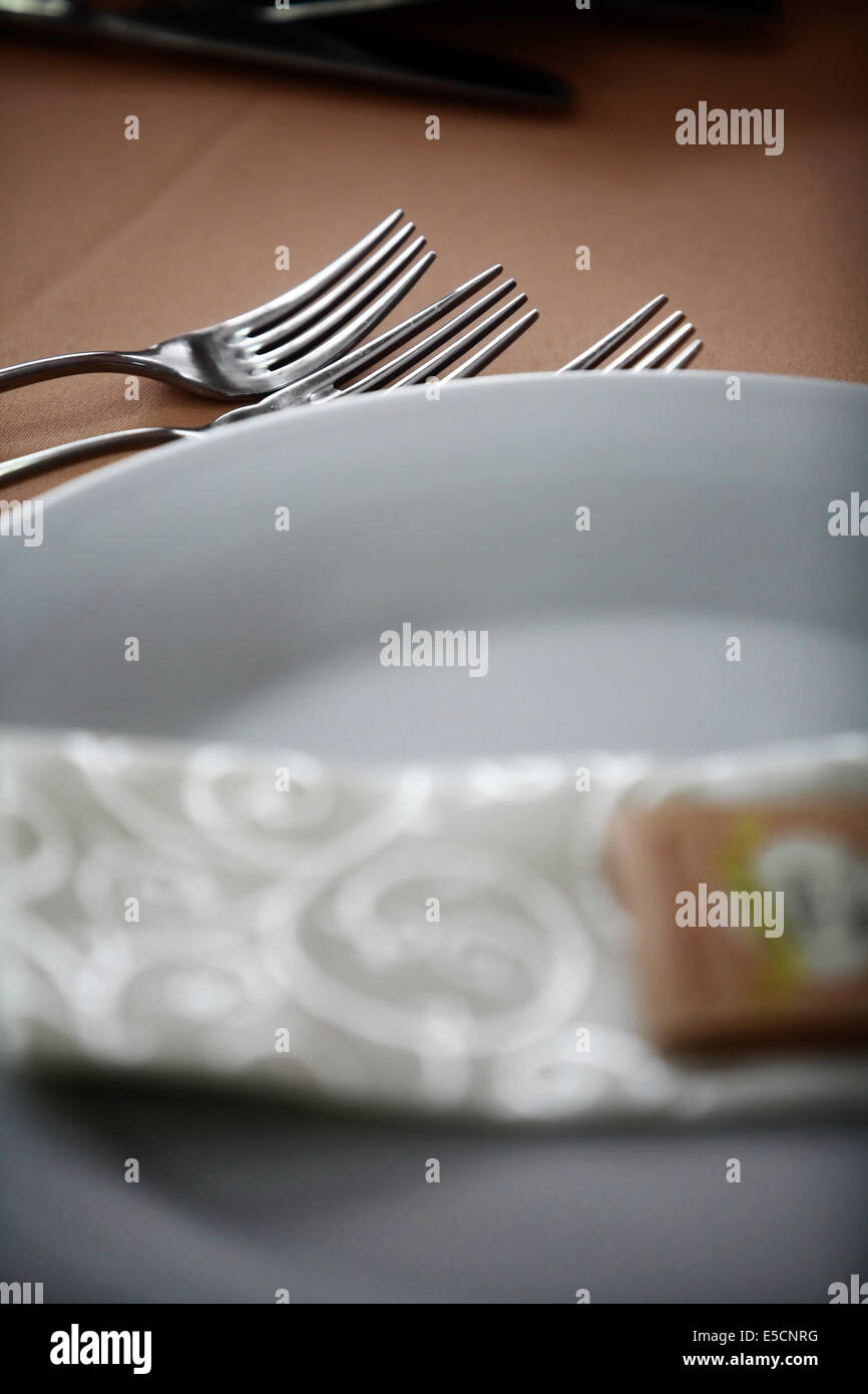 Shot with a dinner table in a restaurant Stock Photo - Alamy