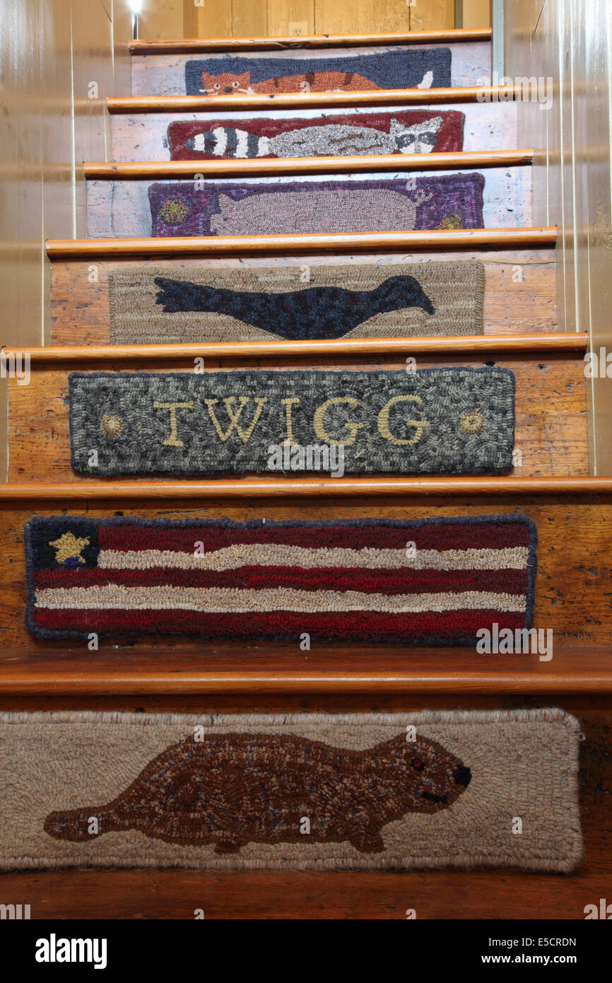 Folk art, hooked rugs going up stairs. Depicting animals, American flag ...