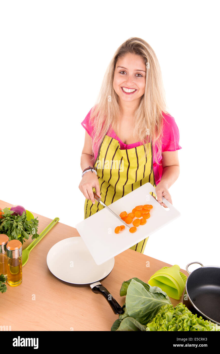 Beautiful woman cooking in the kitchen Stock Photo - Alamy