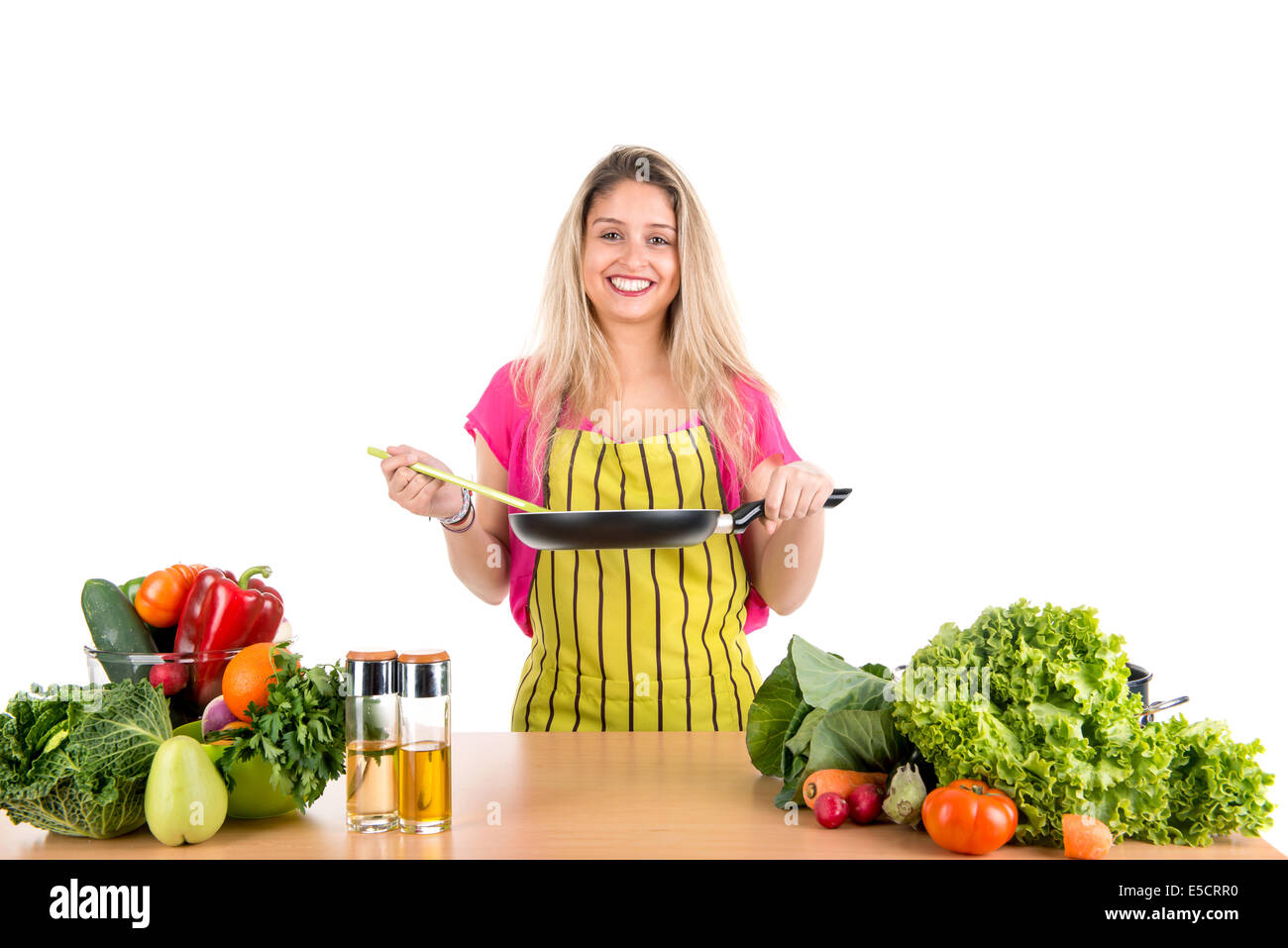 Beautiful woman cooking in the kitchen Stock Photo - Alamy