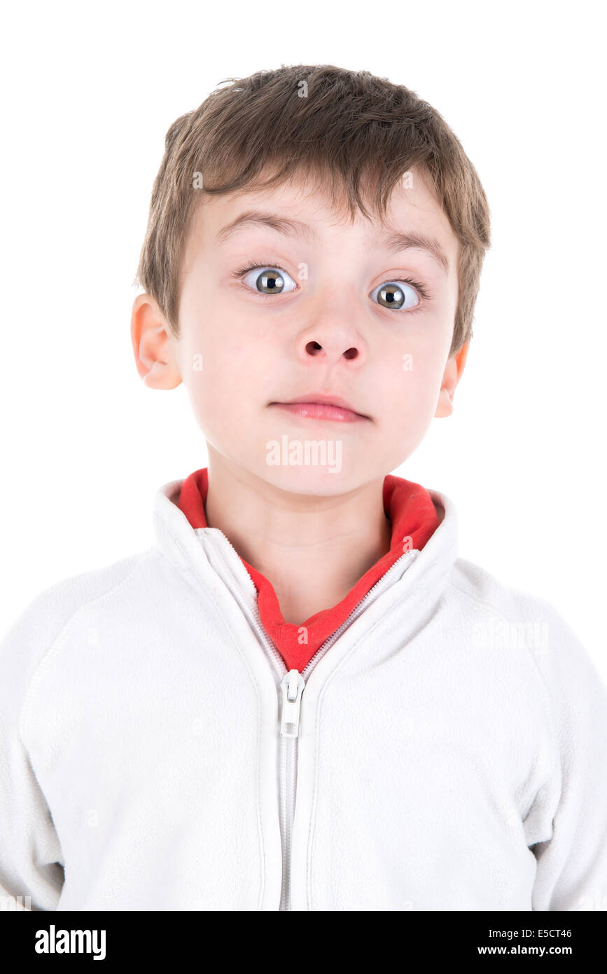 Young boy making faces isolated in white Stock Photo - Alamy