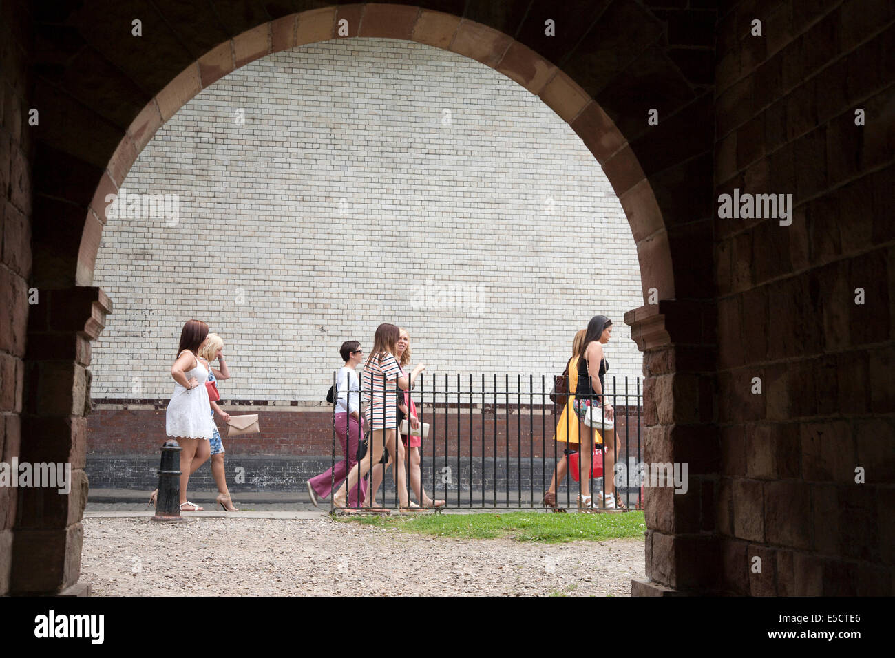 Arch of Roman Fort in Castlegate, Manchester, England, UK with People ...