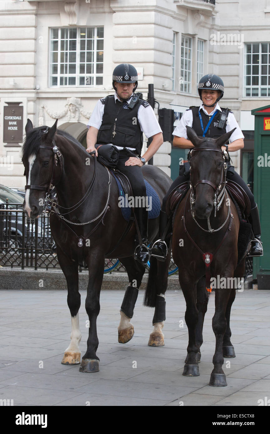 London, UK. 28 July 2014. Police officers in Piccadilly Circus. Launch ...