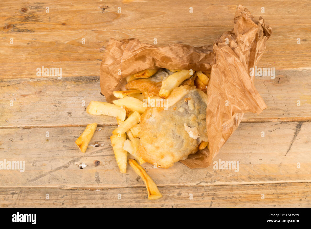 Traditional homemade fish and chips in a paper wrap Stock Photo - Alamy