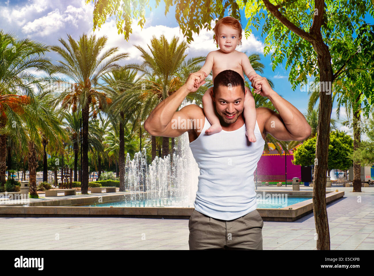 Loving father with daughter on shoulders Stock Photo - Alamy