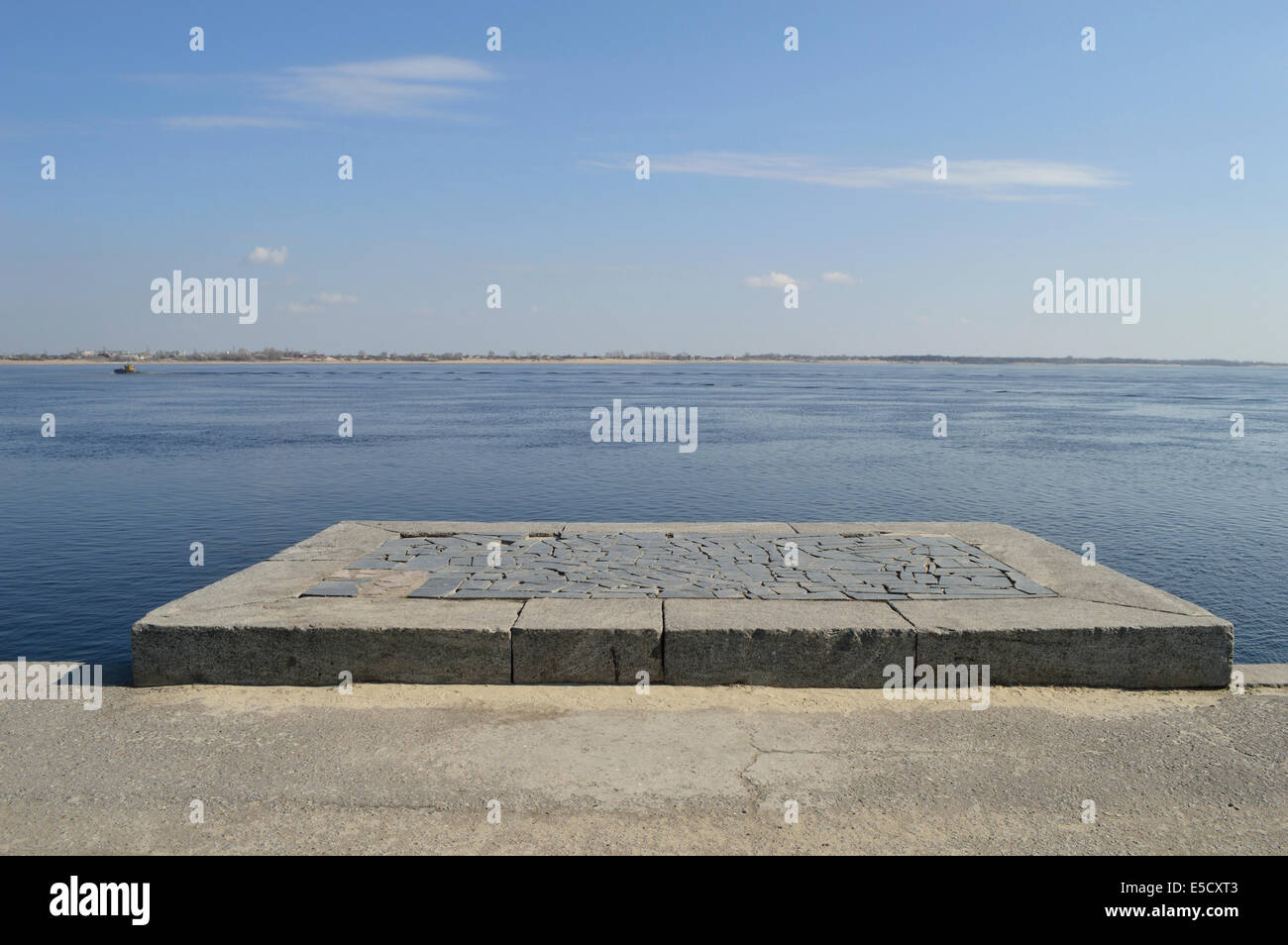 Granite pier against summer river water Stock Photo - Alamy