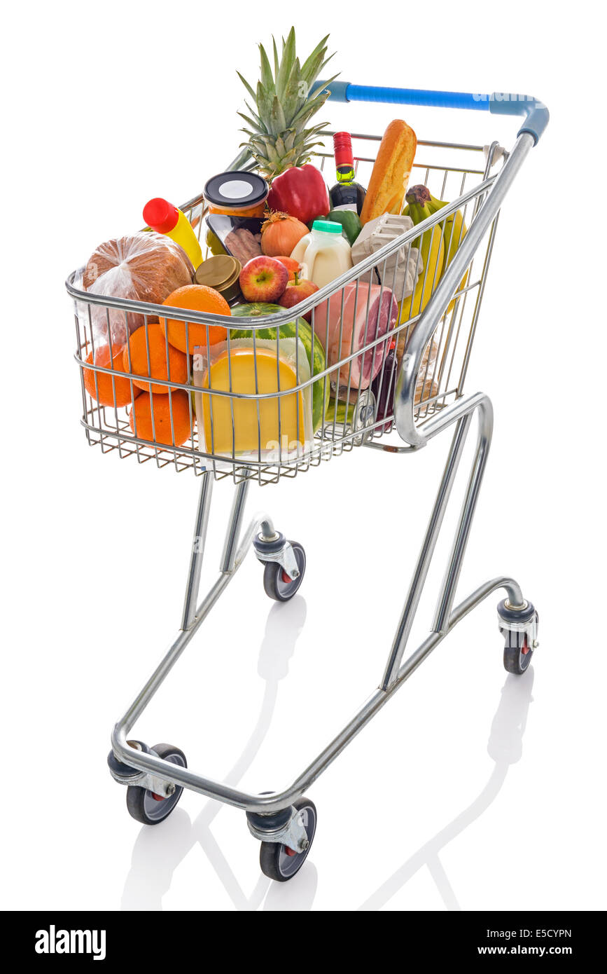 Shopping trolley full of fresh groceries isolated on a white background ...