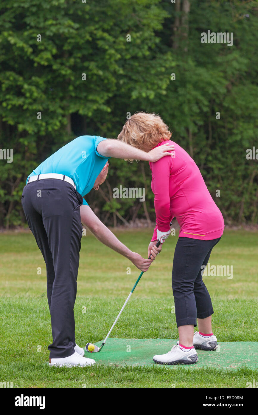 Female golfer driving golf ball High Resolution Stock Photography and ...