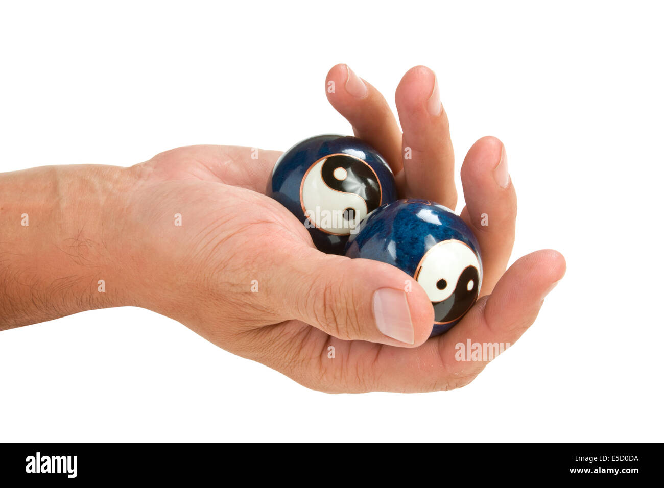 hand holds a ball isolated on white background Stock Photo - Alamy