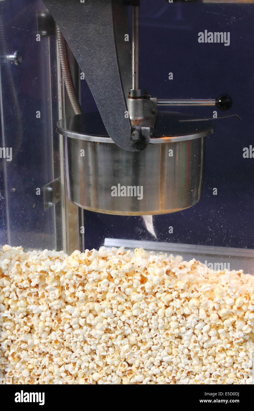 Popcorn machine at the entrance of a cinema Stock Photo - Alamy