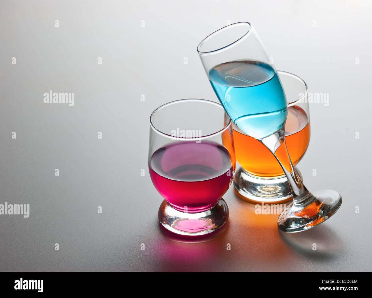 three glasses with drinks Stock Photo - Alamy