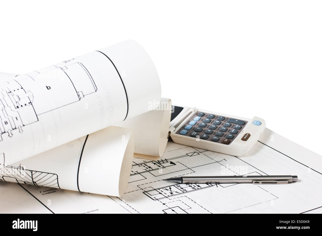 rolled technical drawings and a calculator Stock Photo - Alamy