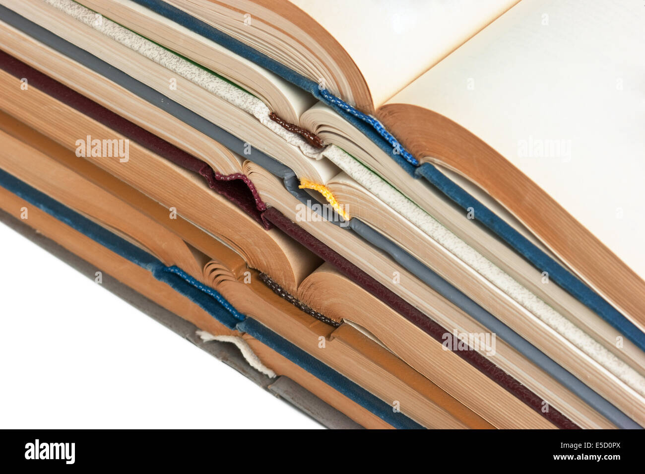 stack of open books isolated on a white background Stock Photo - Alamy