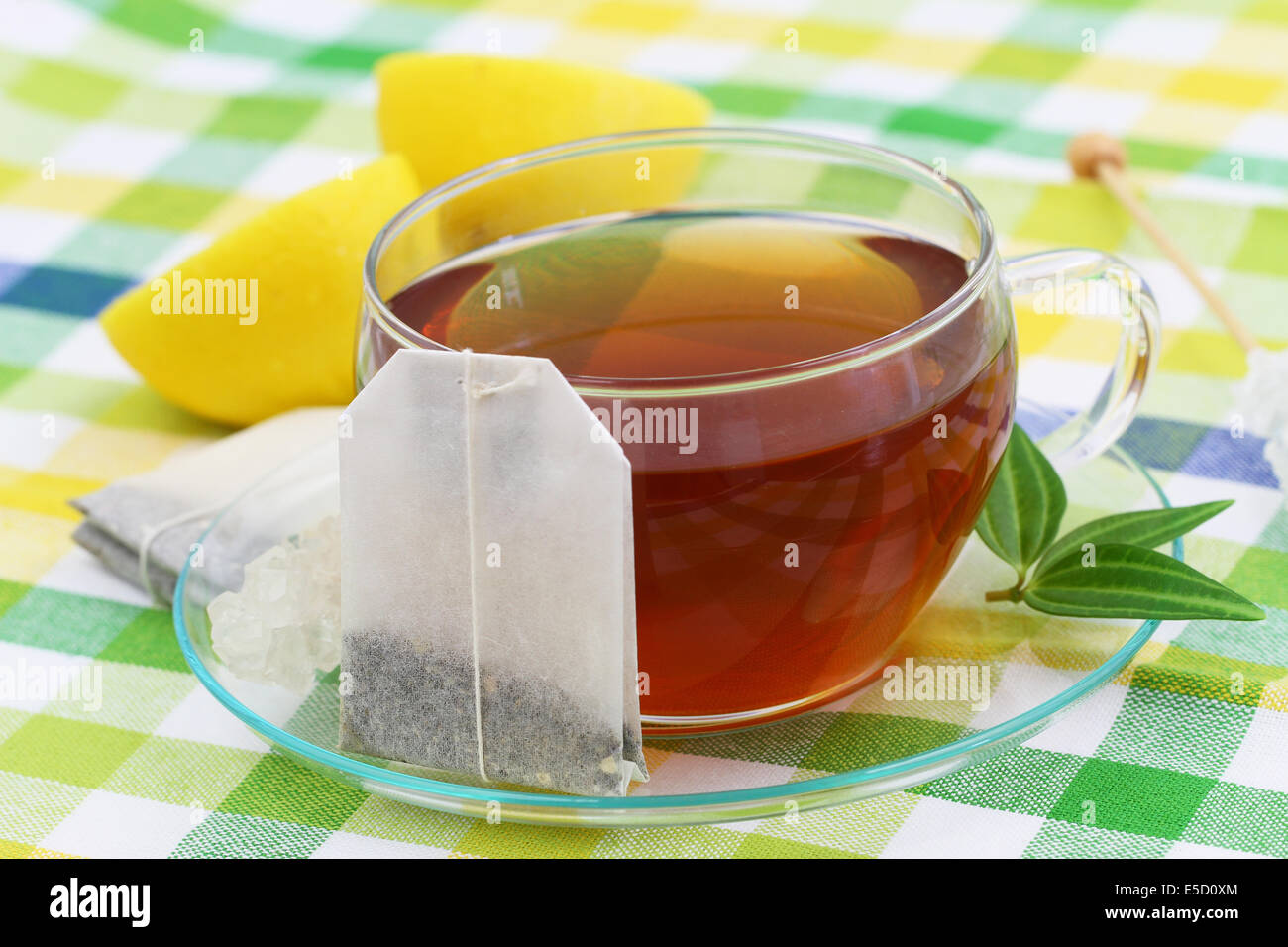 Tea, teabag and fresh lemon Stock Photo - Alamy