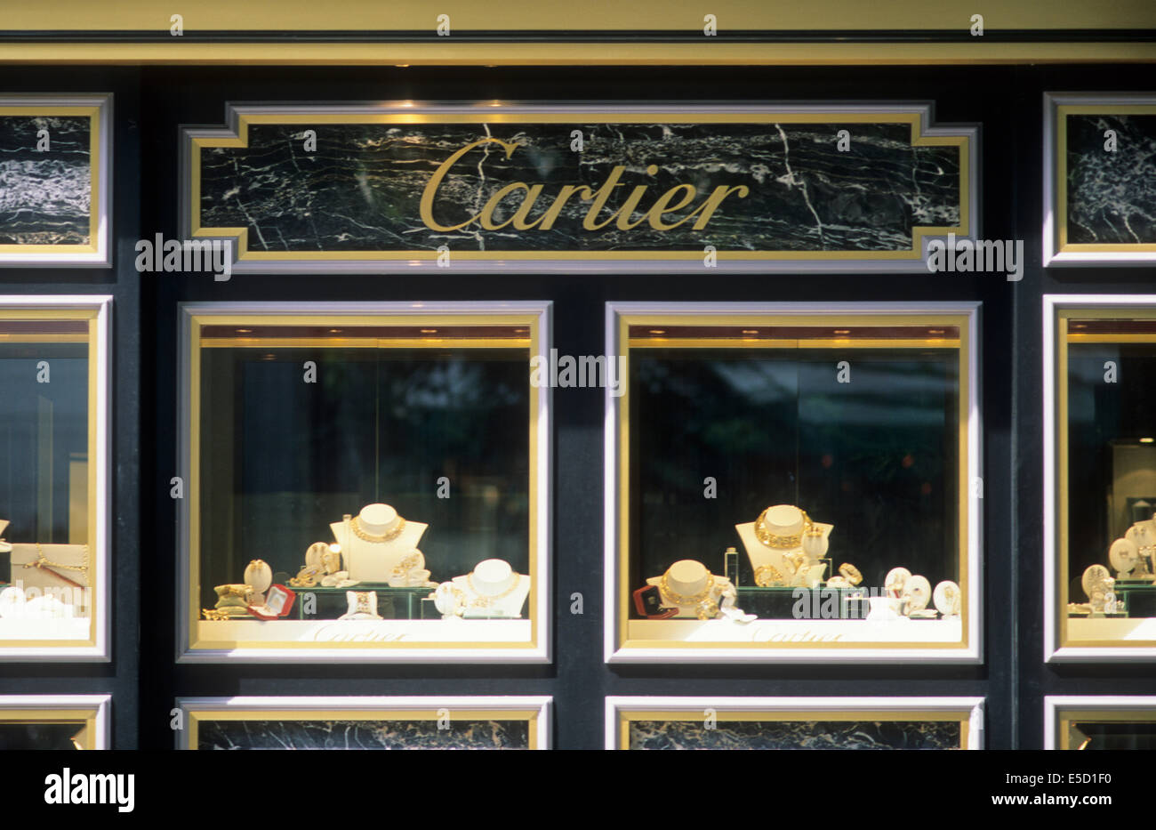 Switzerland, St Moritz, glitzy shops and cars abound in the beautiful ...