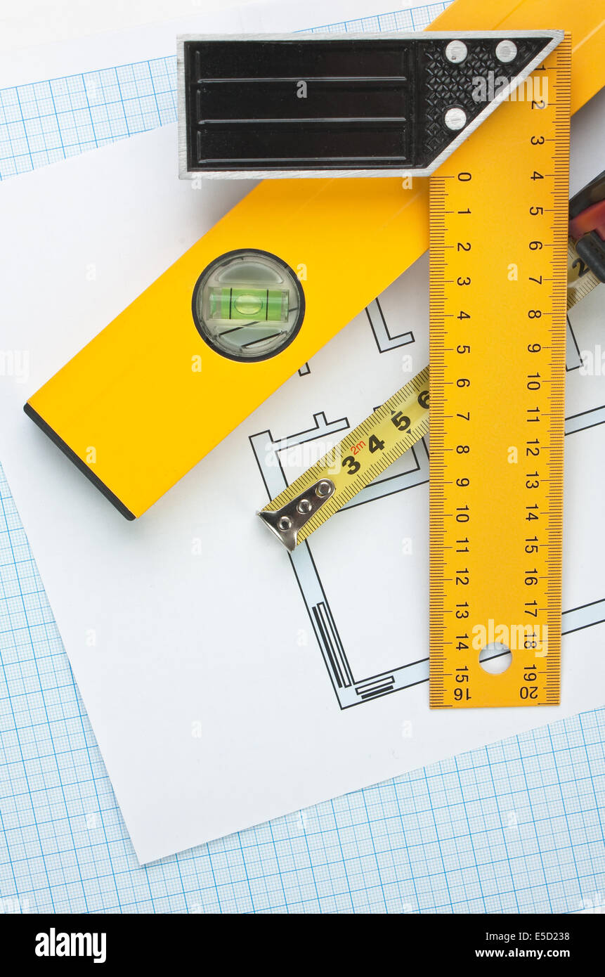 development drawings and tools on graph paper Stock Photo - Alamy