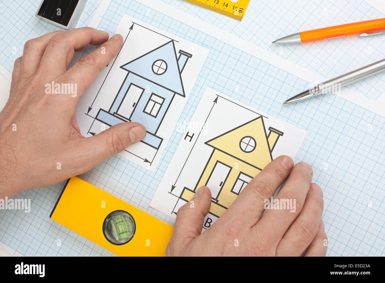 development drawings and tools on graph paper Stock Photo - Alamy
