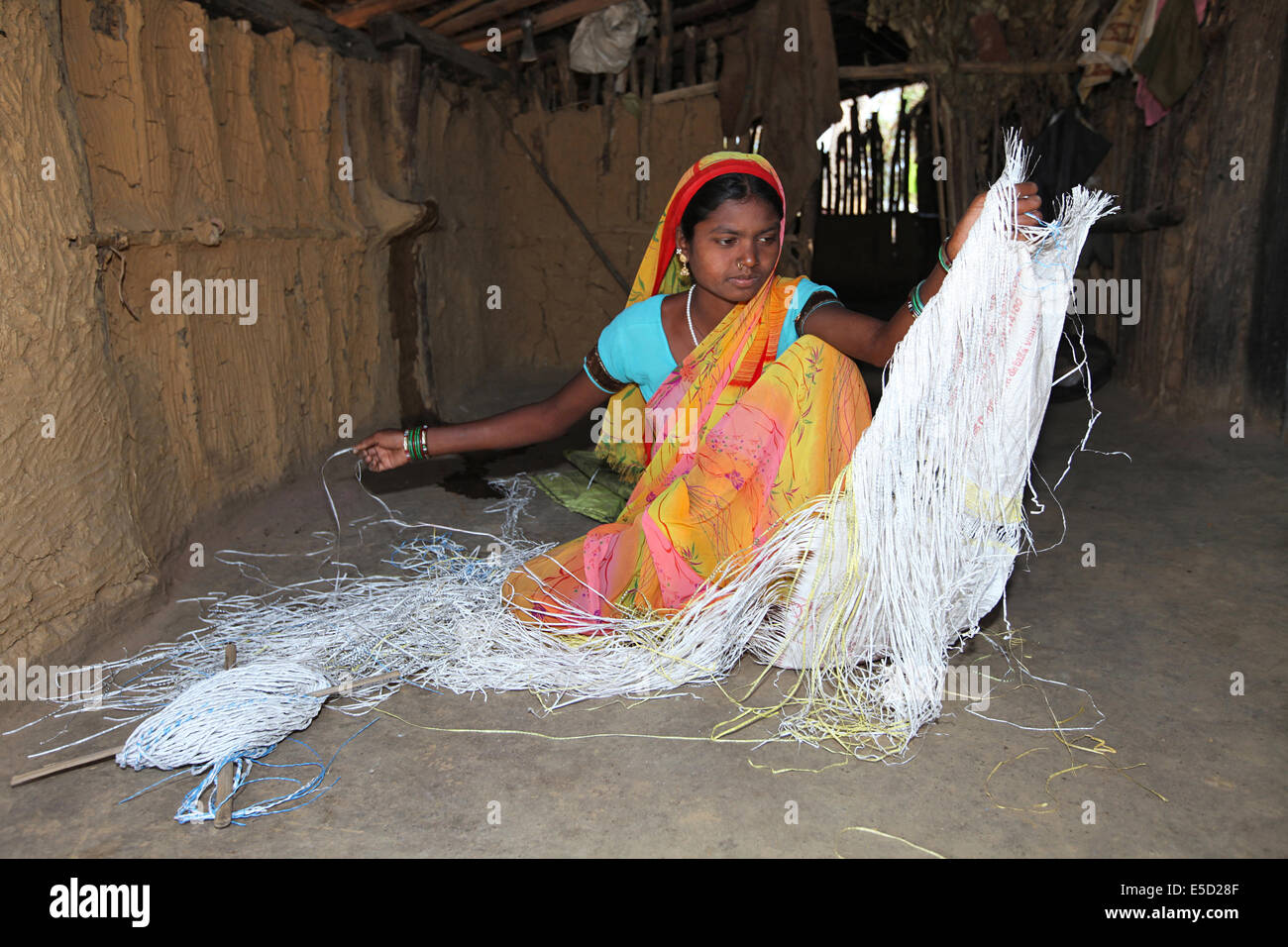 Tribal woman making rope, Birhor tribe. Chueya Village, Korba District ...