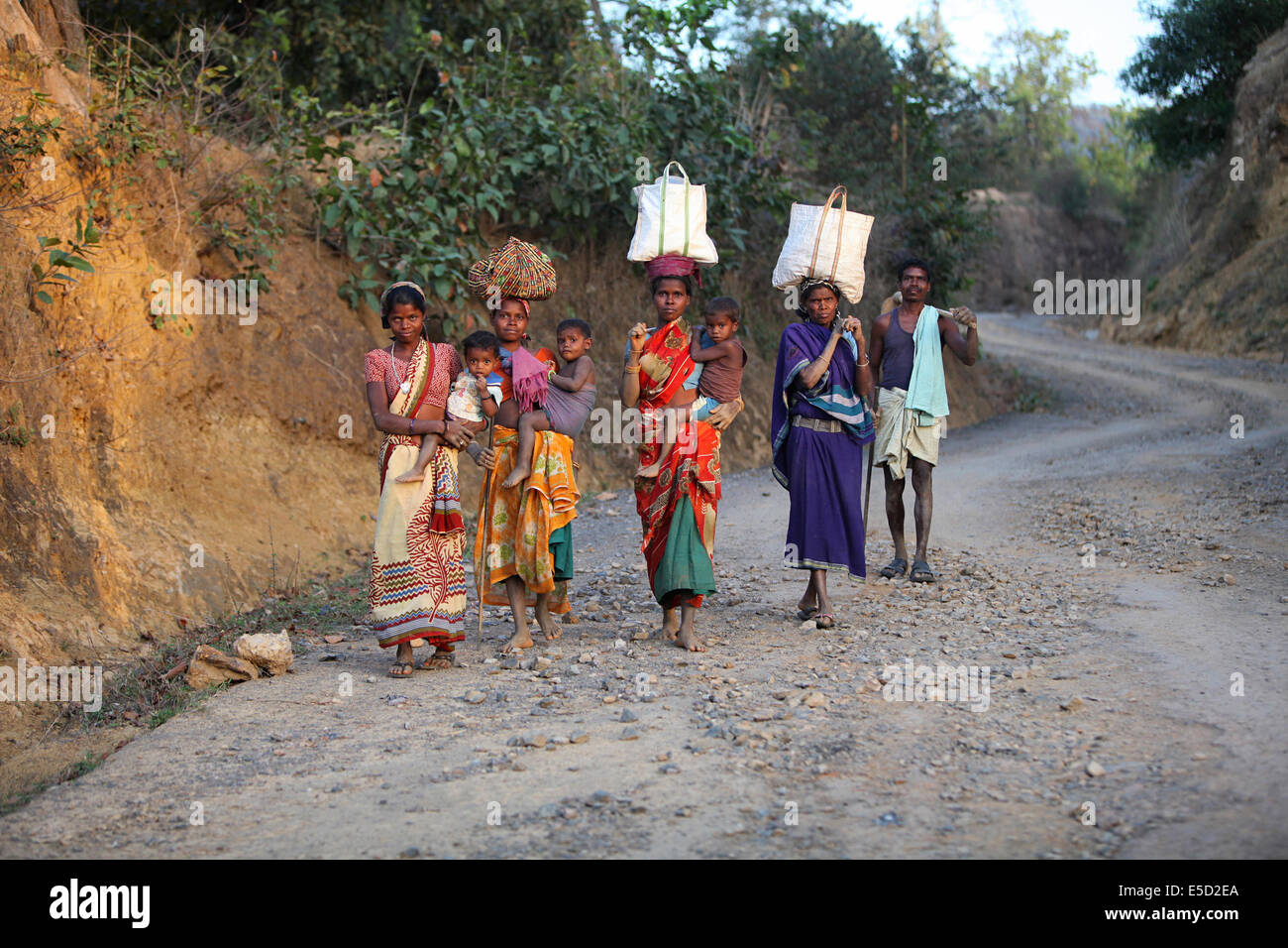 Tribal people walking down the road, Pahadi Korba tribe, Bogadaghat ...