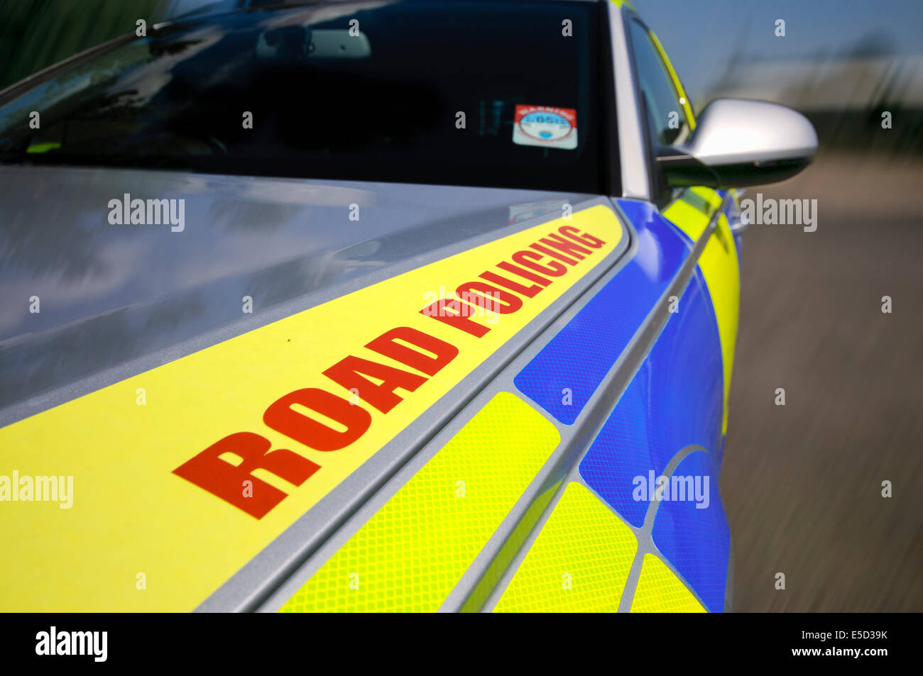 Speeding vehicle drives over hi-res stock photography and images - Alamy