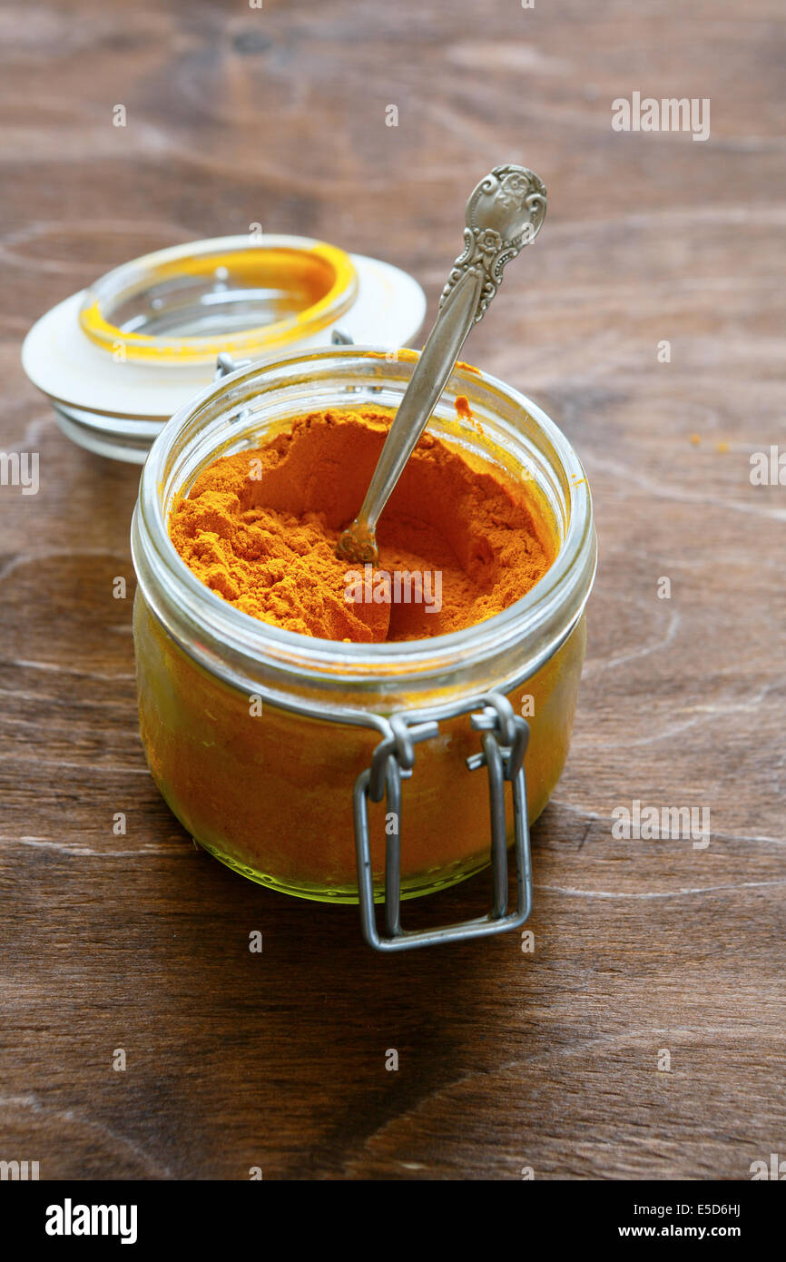 Eastern spice turmeric in a jar, food Stock Photo - Alamy