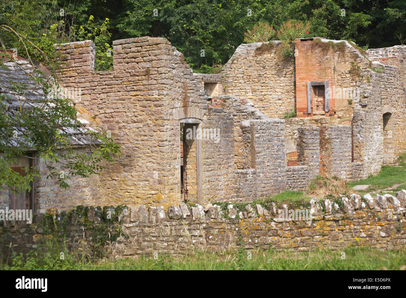 ruins of abandoned buildings at Tyneham Village, Dorset UK in July ...