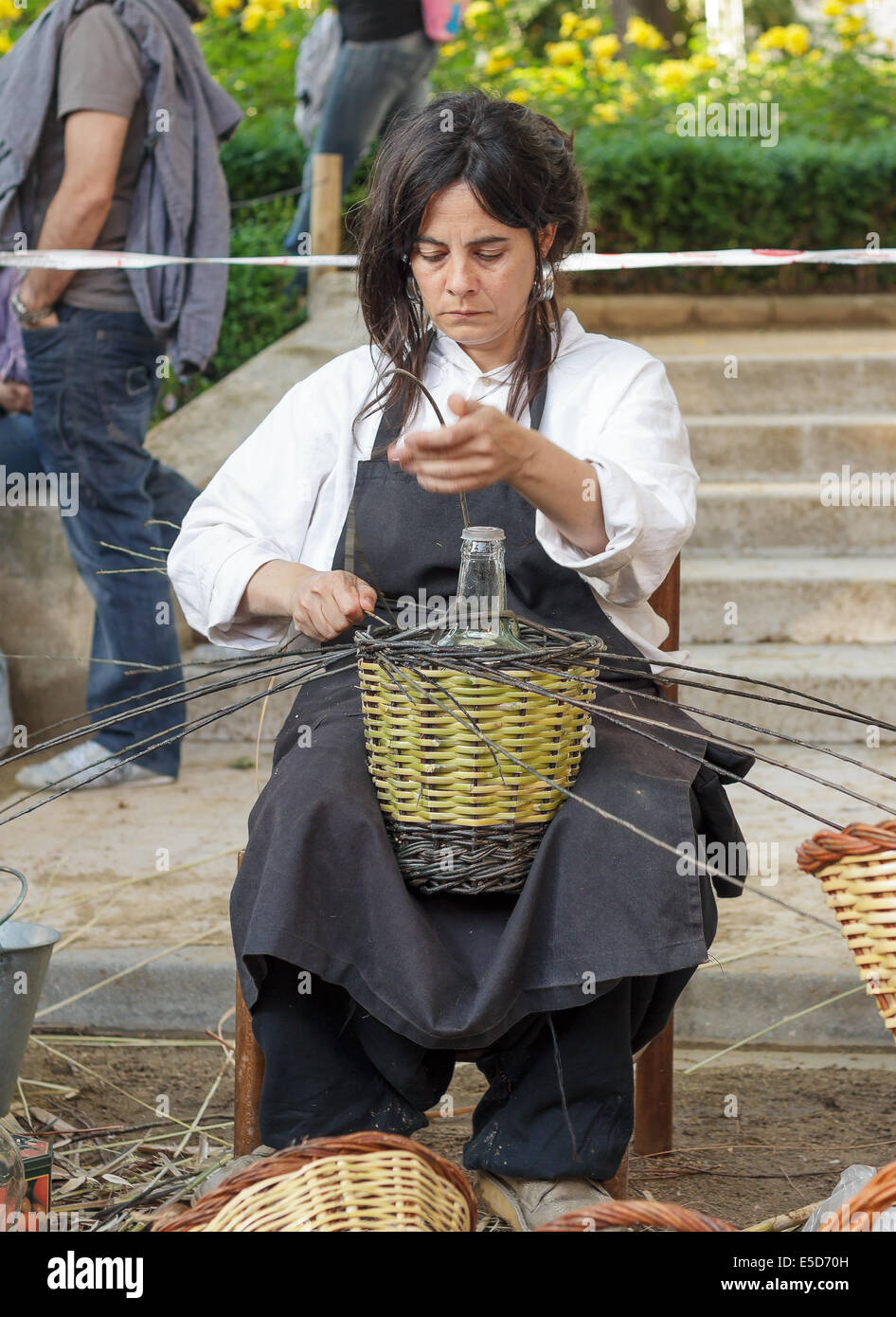 artist showing the craft of basket-making (Editorial use only Stock ...