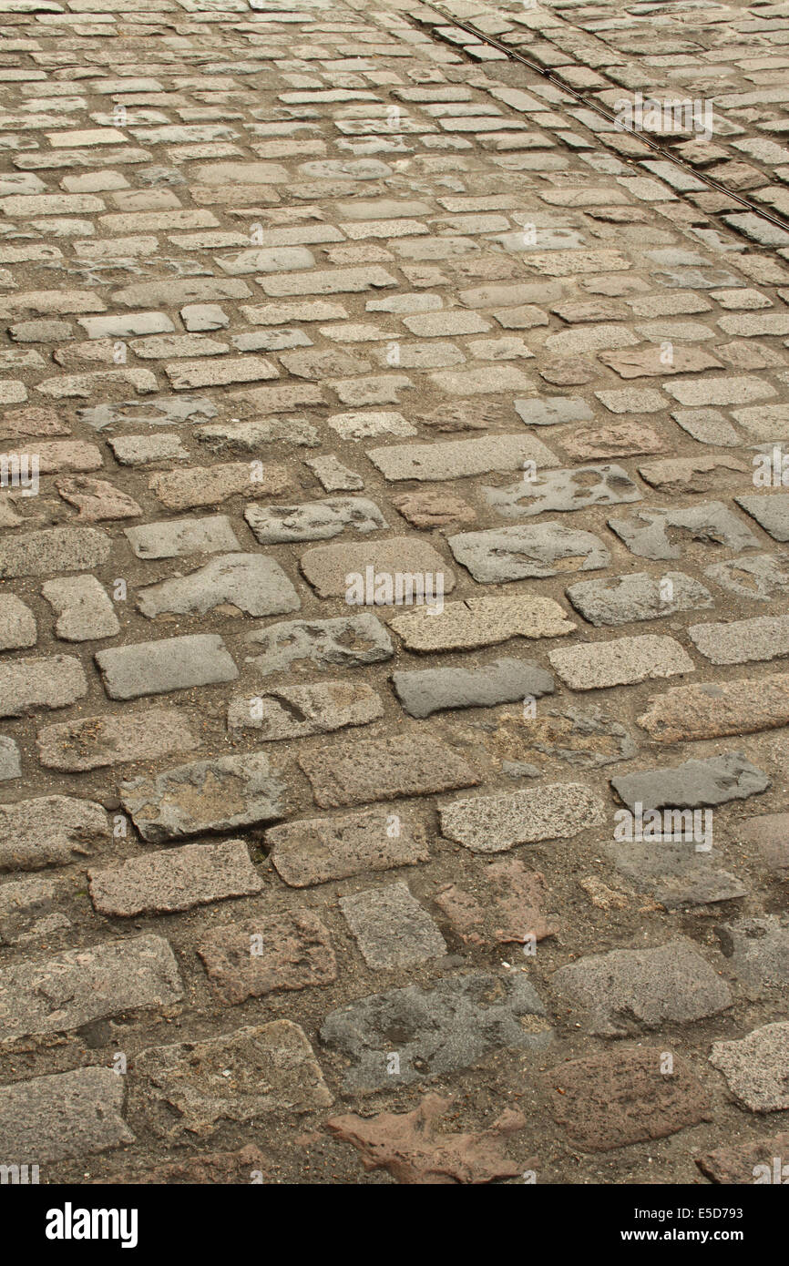 Old worn brickwork paving worn block work and weathered brick path ...