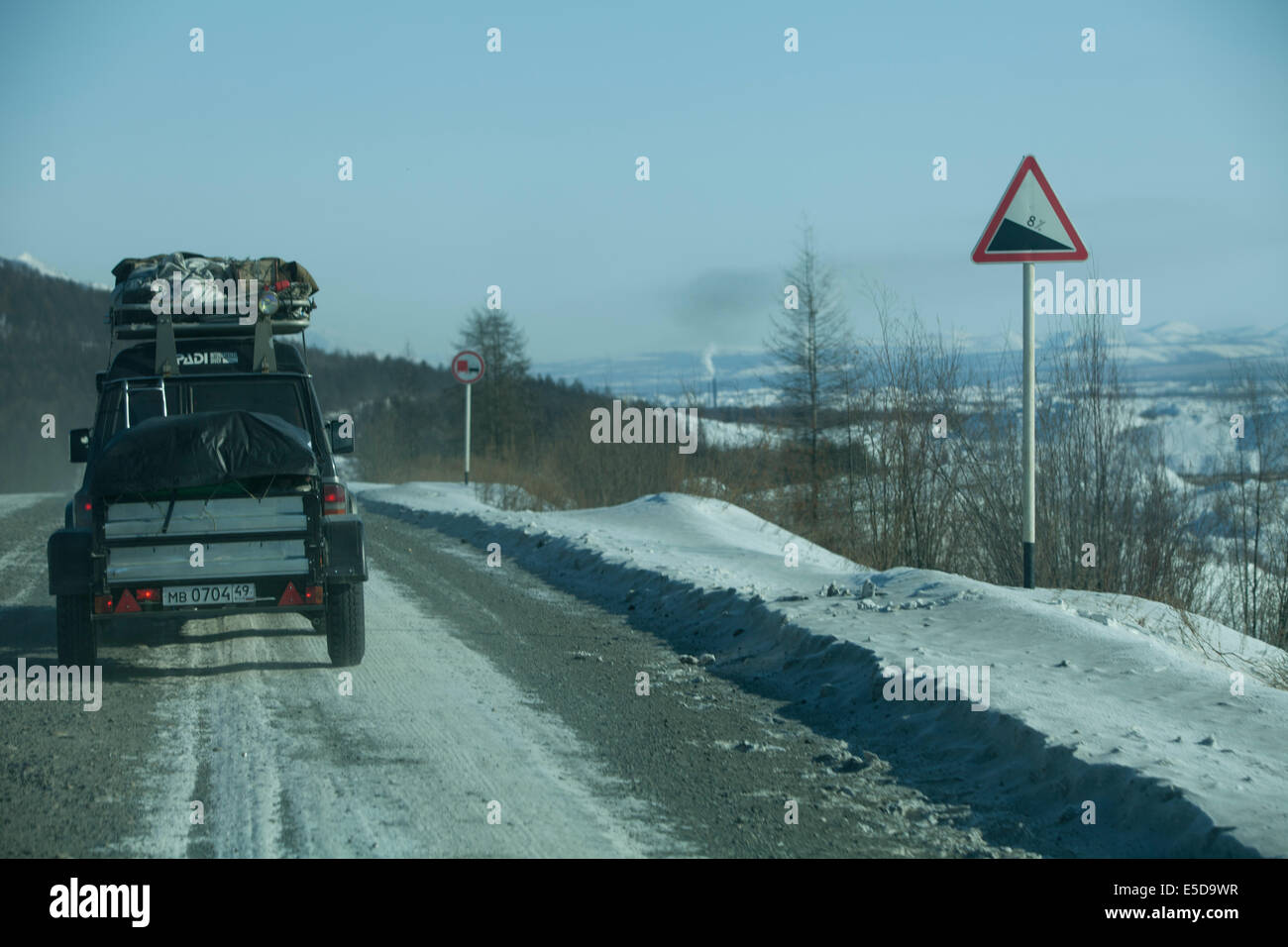 4WD expedition deserted snow road mountains Siberia Stock Photo - Alamy