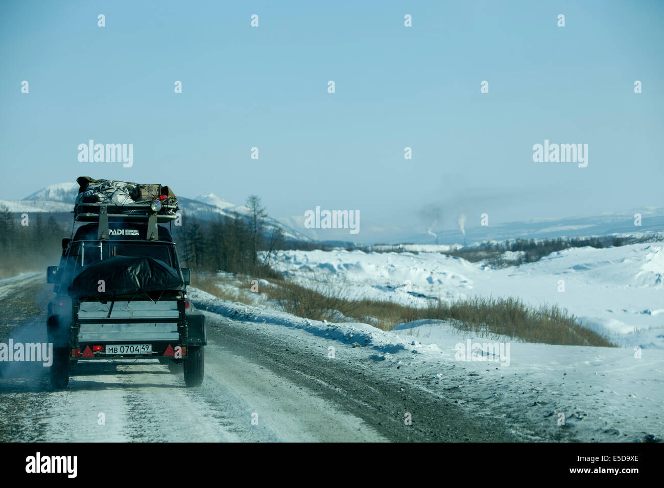 4WD expedition deserted snow road mountains Siberia Stock Photo - Alamy