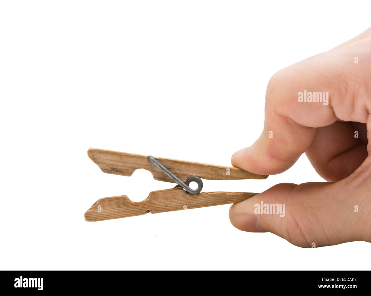 hand holds the clothespin isolated on a white background Stock Photo ...