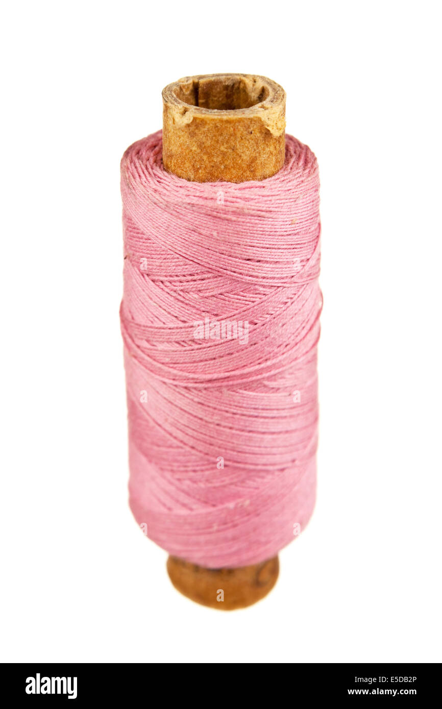 spool of thread isolated on a white background Stock Photo - Alamy