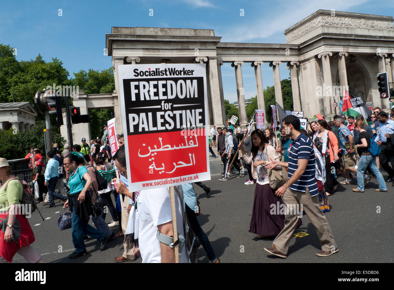People at Palestinian demonstration on the streets of London UK against ...