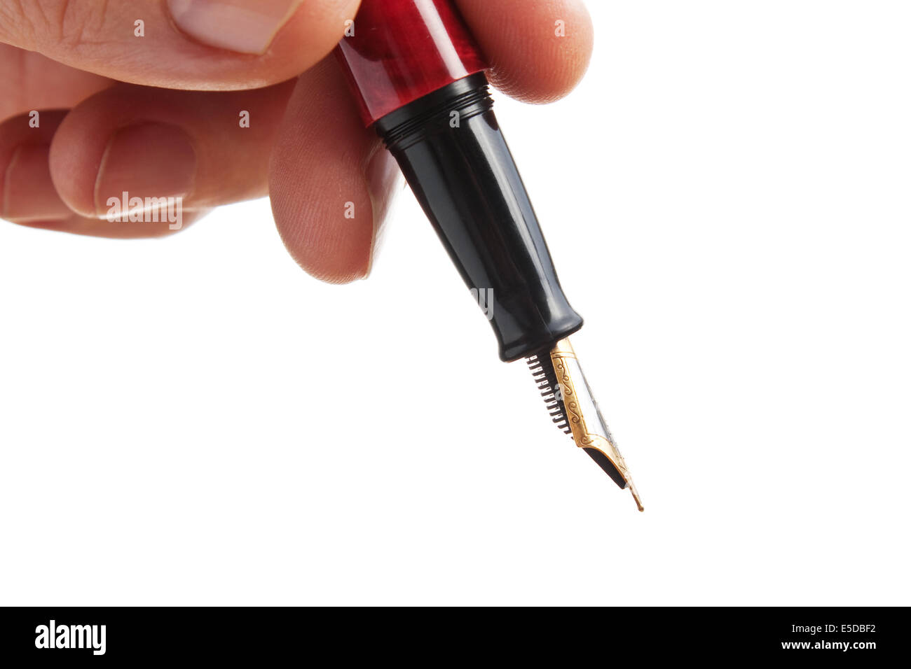 pen in hand isolated on white background Stock Photo - Alamy