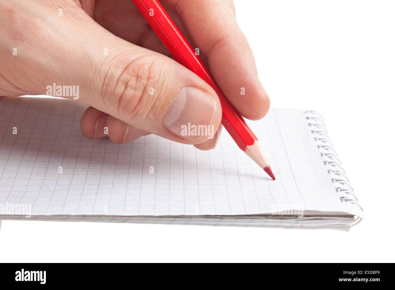 red pencil in hand isolated on white background Stock Photo - Alamy