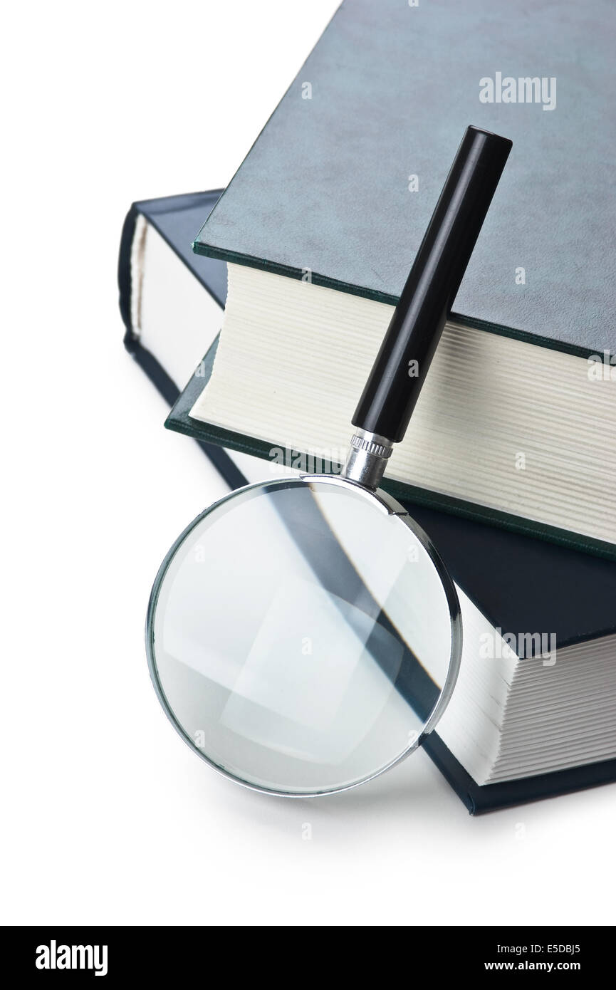 books and magnifying glass isolated on white background Stock Photo - Alamy