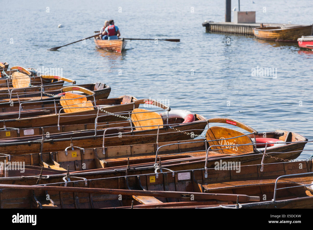 Traditional wooden rowing boats moored at Bowness, Lake Windermere ...