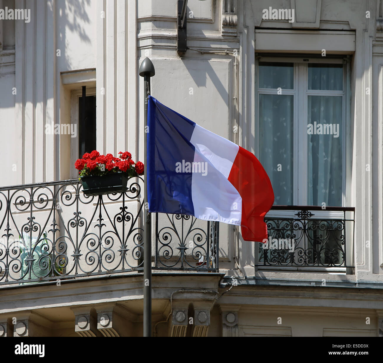 French Flag at Facade of Historic Building in Paris Stock Photo - Alamy