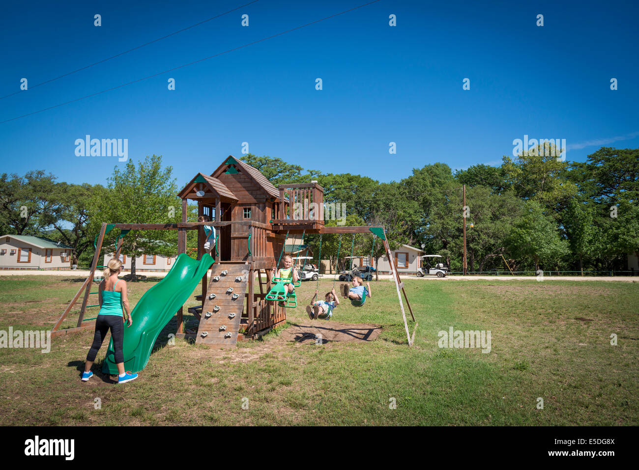 USA, Texas, Playground with children and mother Stock Photo - Alamy