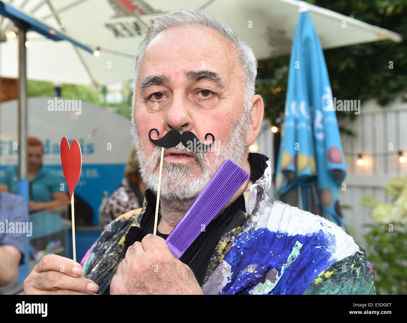 Celebrity hairdresser Udo Walz poses at the party for his 70th birthday ...