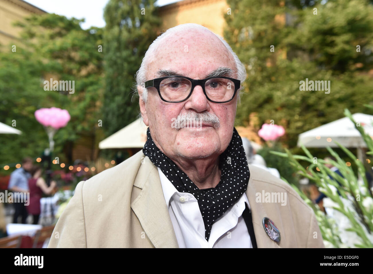 F. C. Gundlach poses at the party for Walz's 70th birthday at 'Bar ...